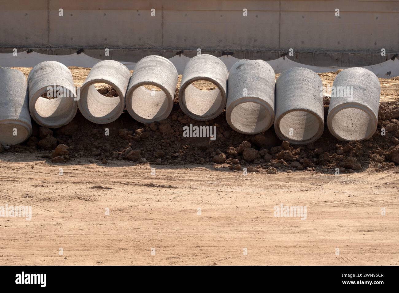Concrete tube for Construction in nature background Stock Photo - Alamy
