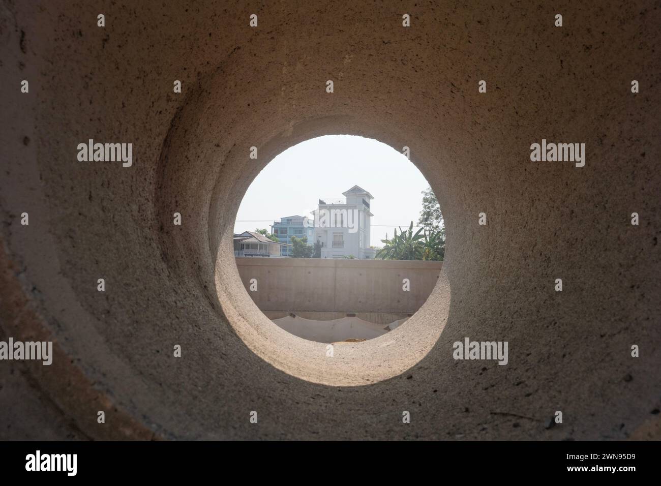 Concrete tube for Construction in nature background Stock Photo - Alamy
