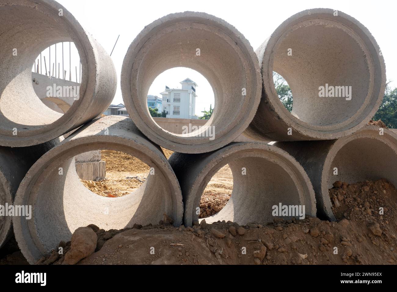 Concrete tube for Construction in nature background Stock Photo - Alamy