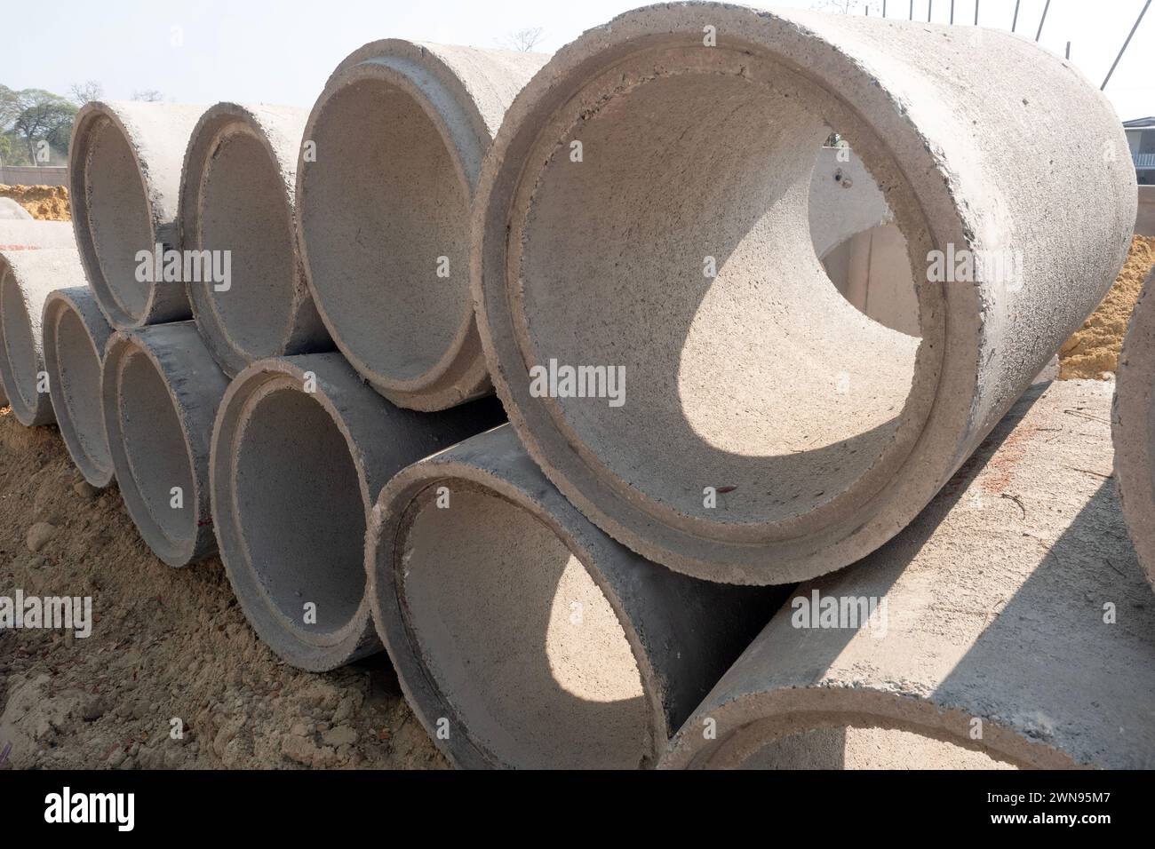 Concrete tube for Construction in nature background Stock Photo - Alamy