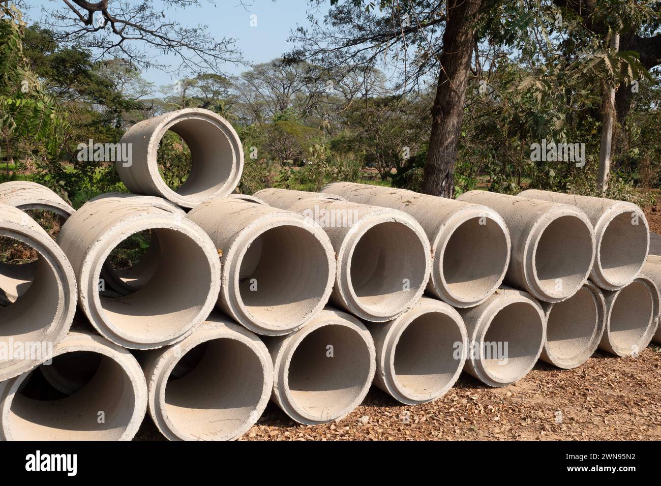 Concrete tube for Construction in nature background Stock Photo - Alamy