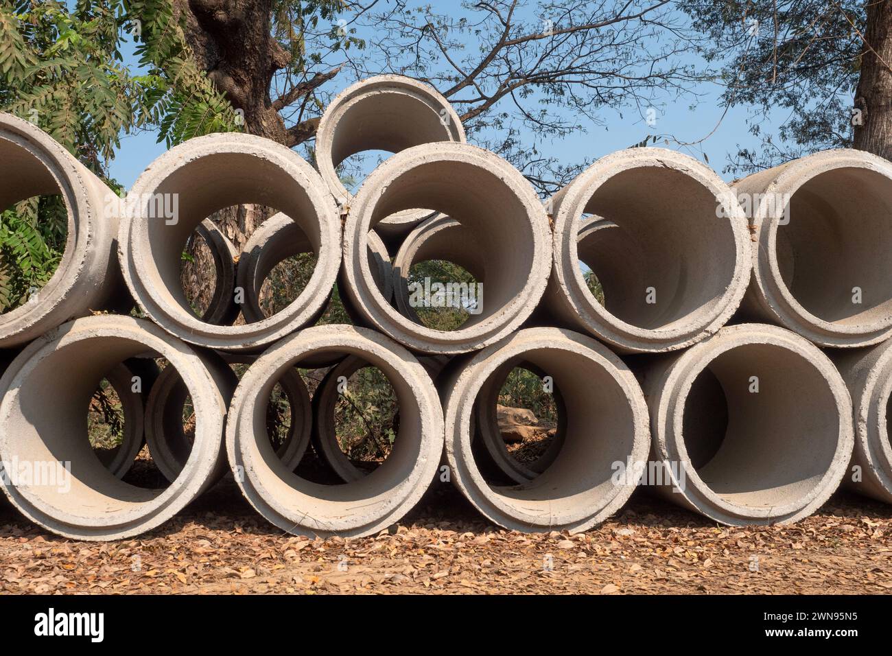 Concrete tube for Construction in nature background Stock Photo - Alamy