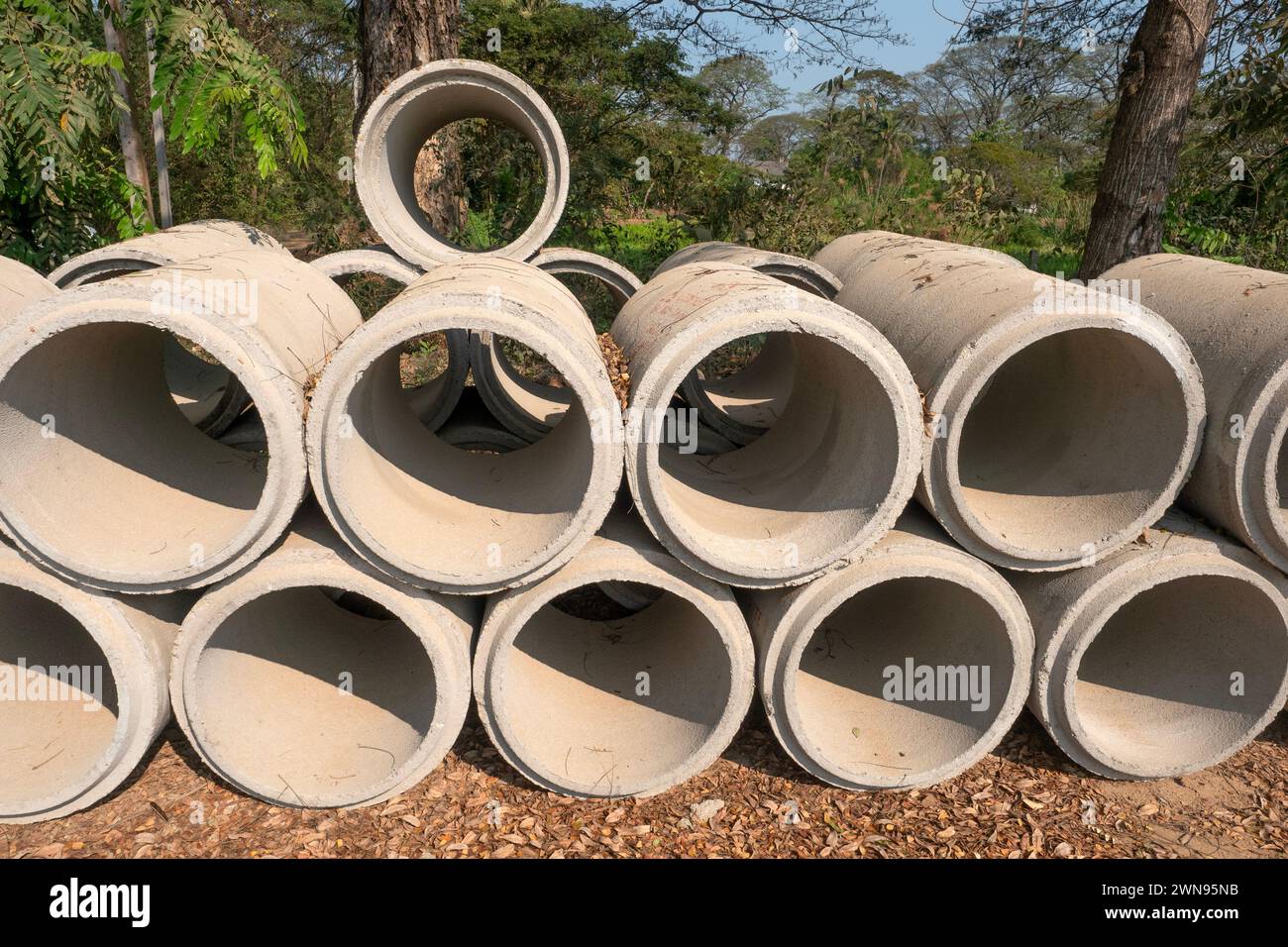Concrete tube for Construction in nature background Stock Photo - Alamy