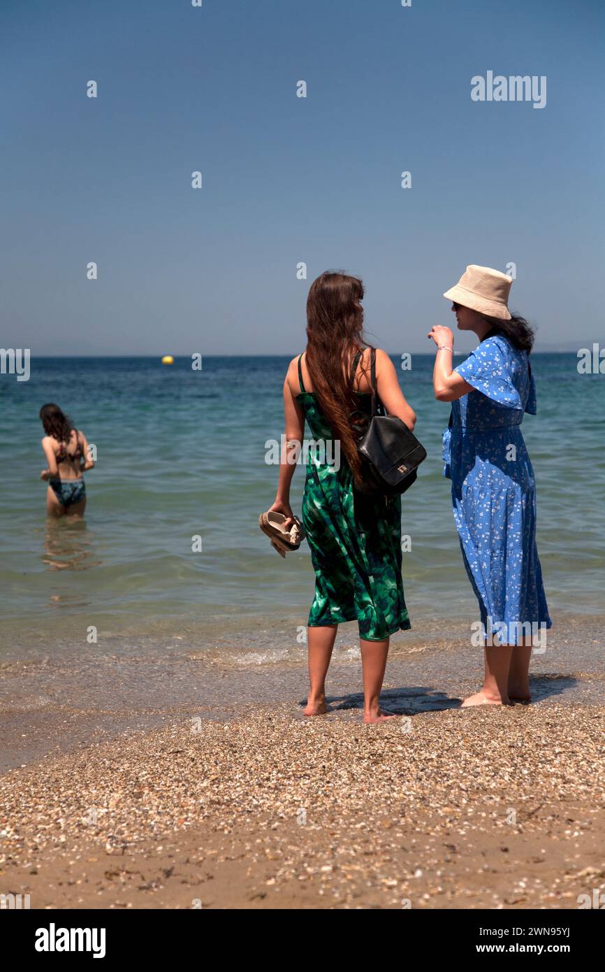Greek beach women hi-res stock photography and images - Alamy