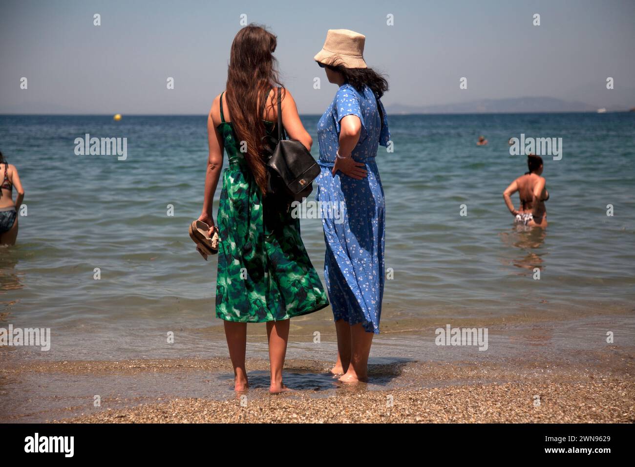 Greek beach women hi-res stock photography and images - Alamy