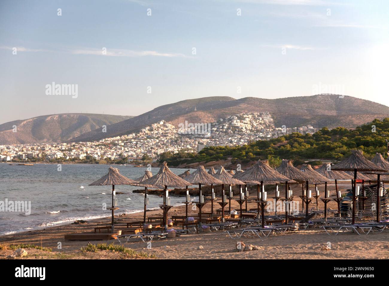 sun umbrellas on kavouri beach vouliagmeni athens riviera athens greece ...