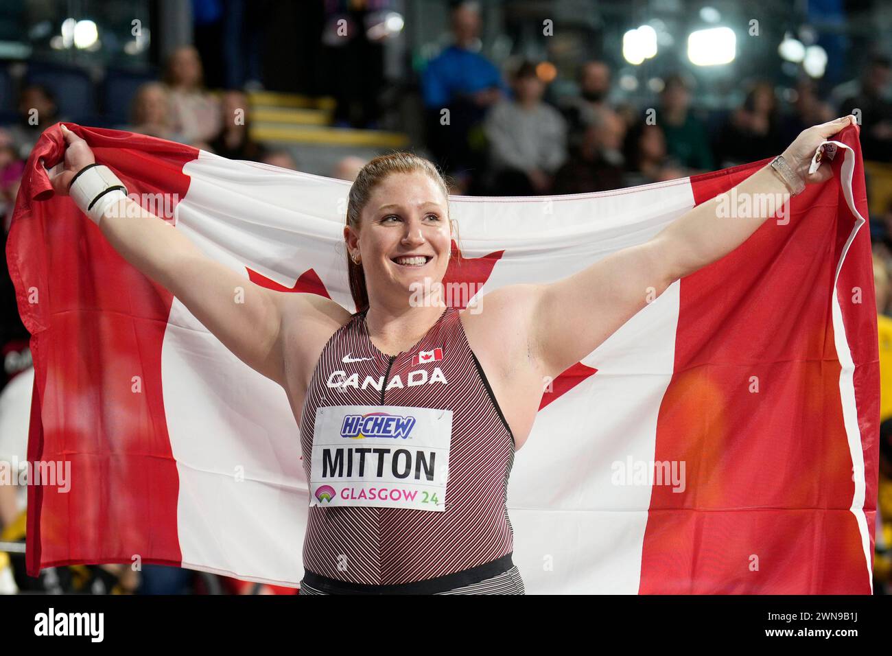 Sarah Mitton, of Canada, poses after winning the gold medal in the ...