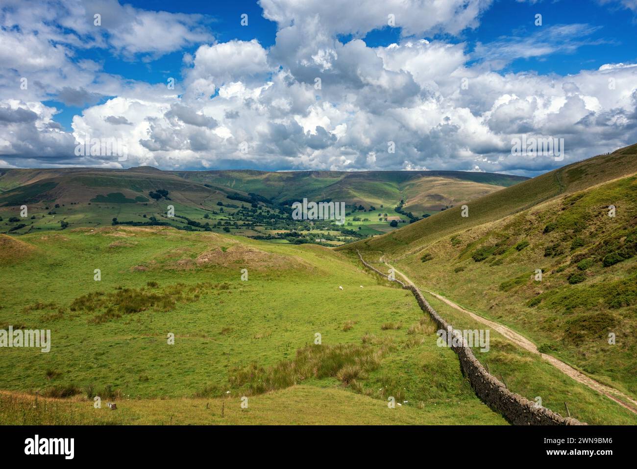 Looking down the Mam Tor bridleway towards Edale with the slopes of Mam ...
