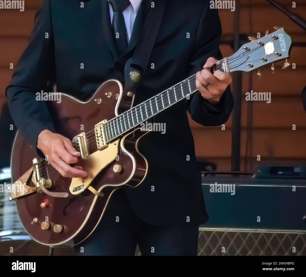 Closeup of a Gretsch guitar being played by a musician in Lindstrom ...