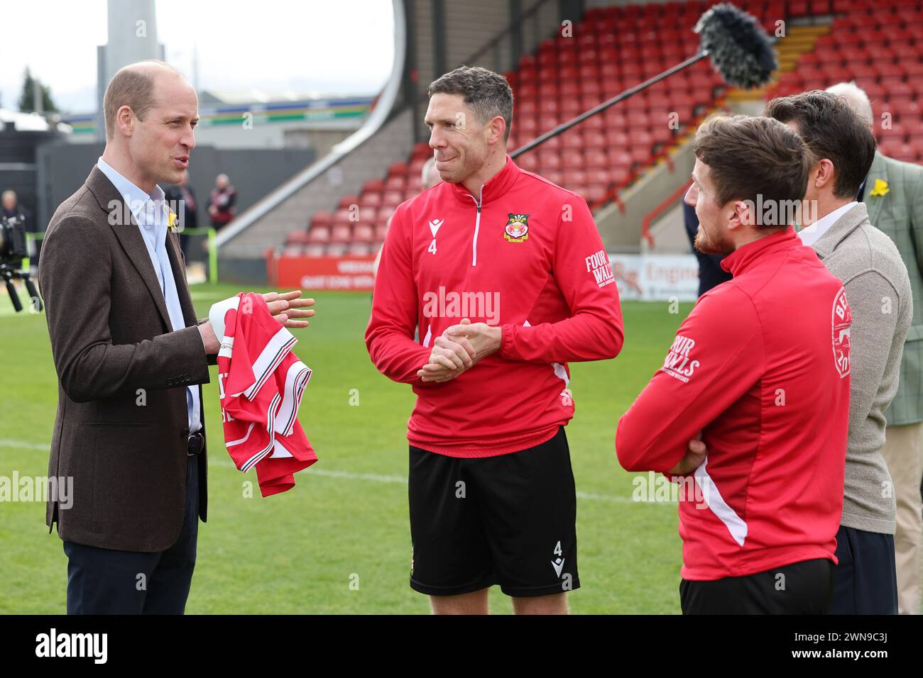 The Prince of Wales with his personalised Wrexham AFC shirt as he meets ...