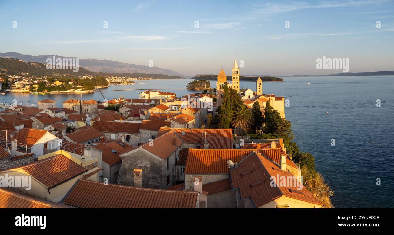 Old town of Rab and church towers in the evening light, Churches of Rab ...