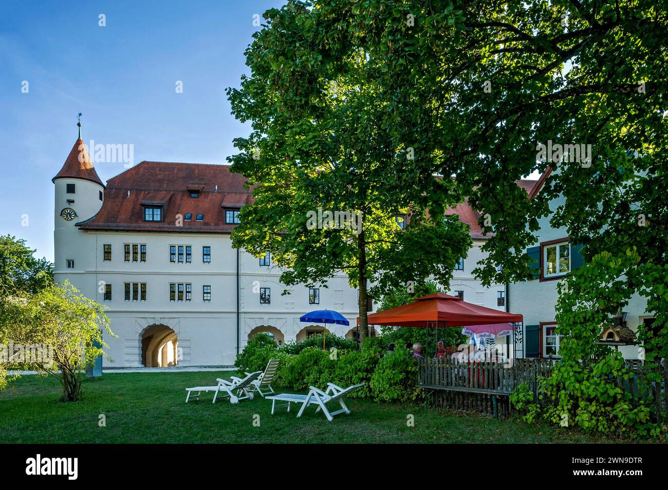 West wing with gate and beer garden of the Burgwirt inn, castle of the ...