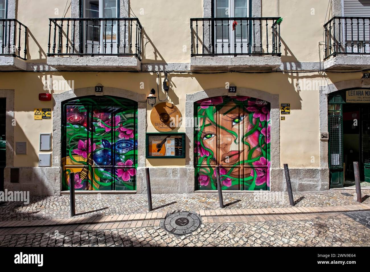 Colorful graffiti art on store shutters enriching the urban street ...