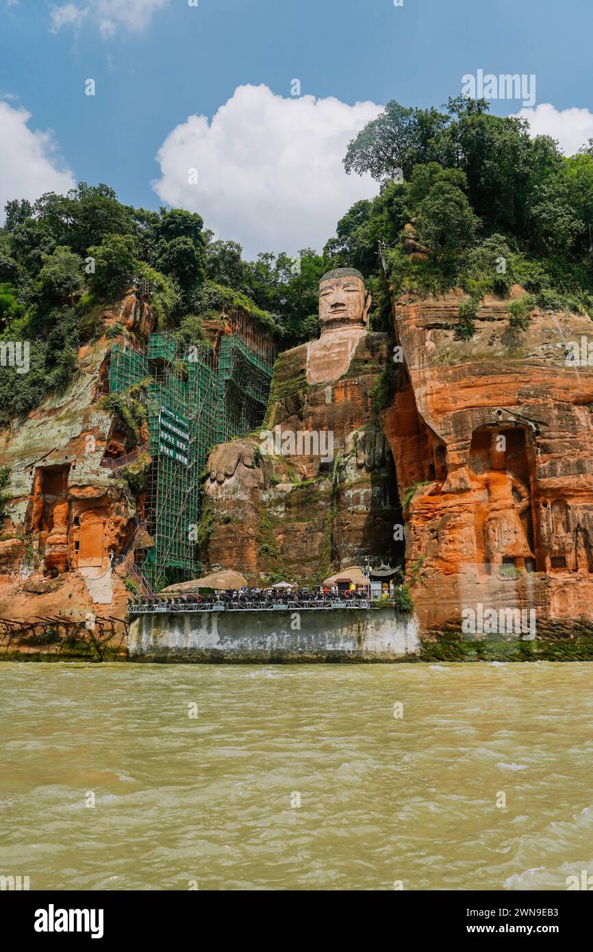 Leshan, Sichuan, China - July 3, 2022: Tourist crowd at the feet of the ...