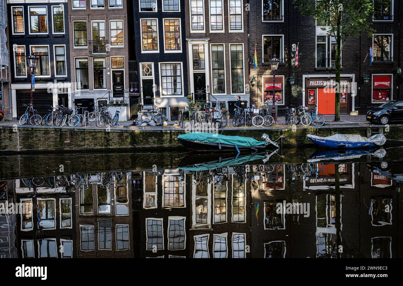 Amsterdam, Netherlands - October 2023: reflections in the canal in the ...