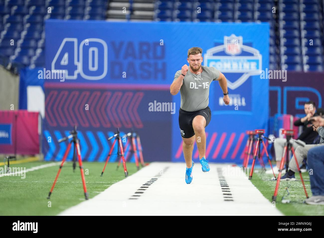 Iowa defensive lineman Logan Lee runs the 40-yard dash at the NFL ...