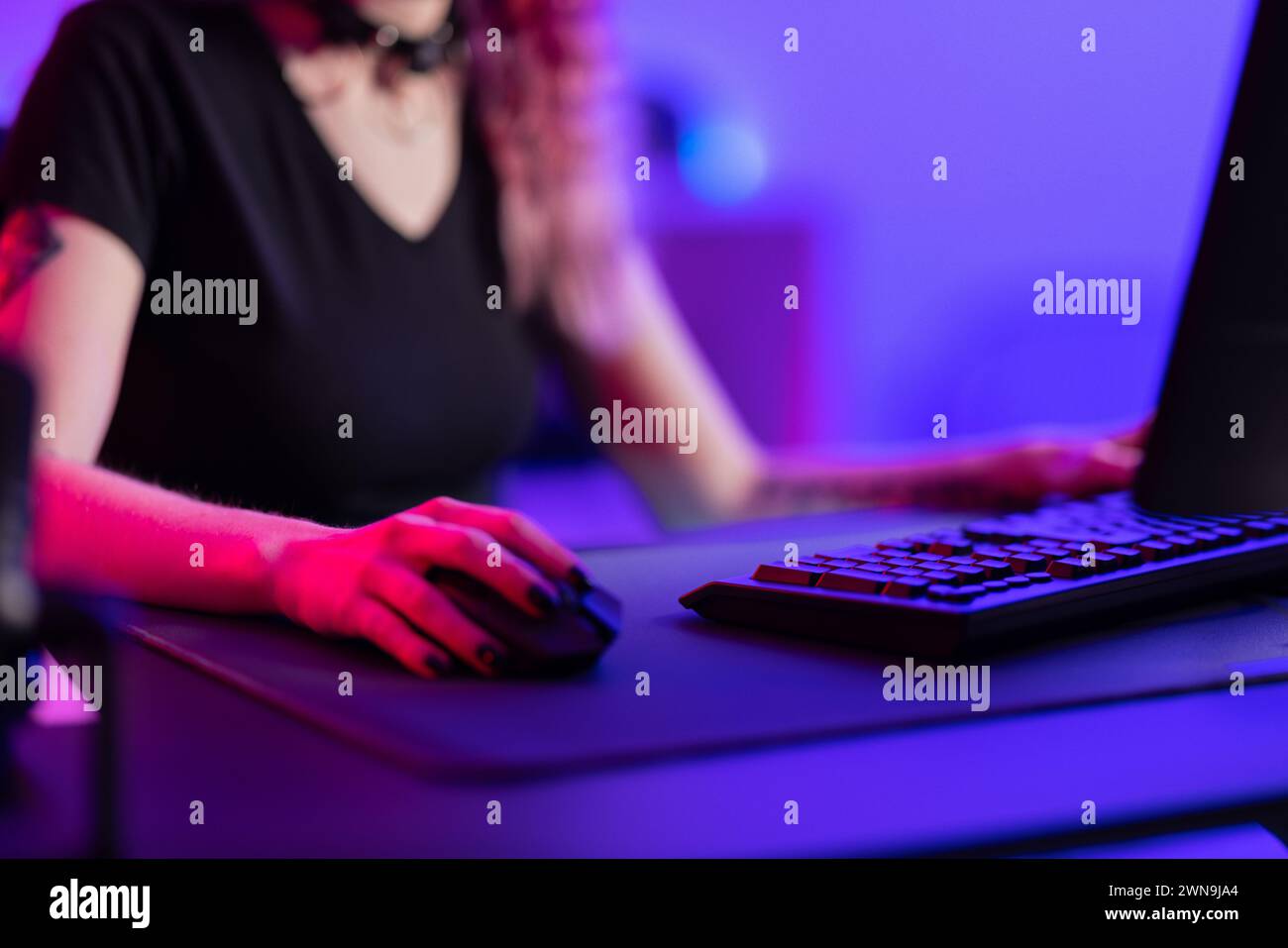 Focused Professional Gamer Playing in a Vibrant Gaming Room Stock Photo ...