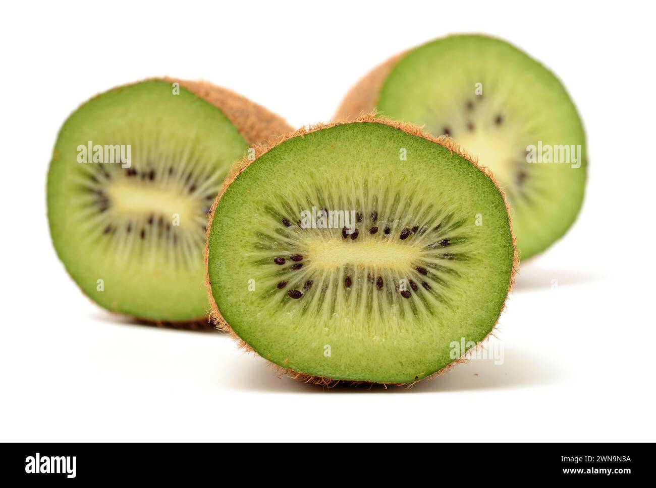 Whole kiwi fruit and his sliced segments isolated on white background ...