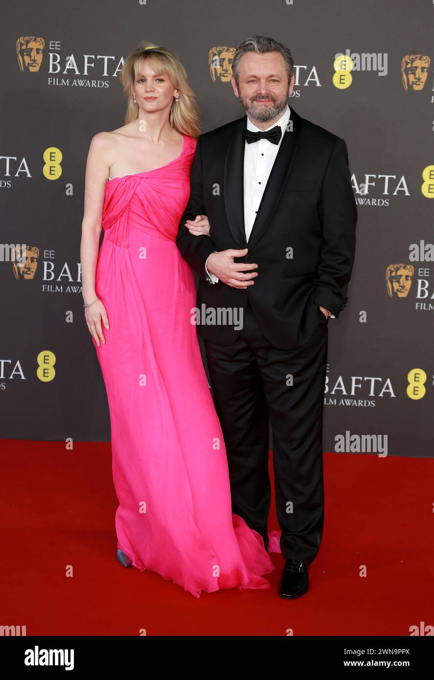 Anna Lundberg and Michael Sheen attend the 2024 EE BAFTA Film Awards at ...