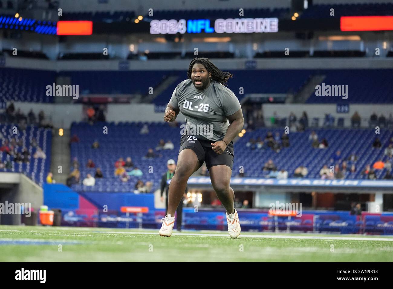Texas defensive lineman T'Vondre Sweat runs a drill at the NFL football ...