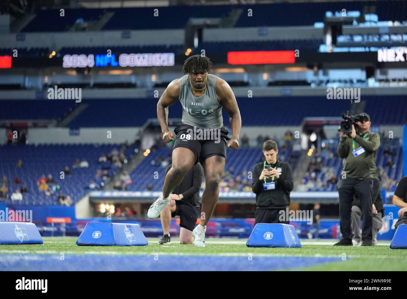 Baylor defensive lineman Gabe Hall runs a drill at the NFL football ...
