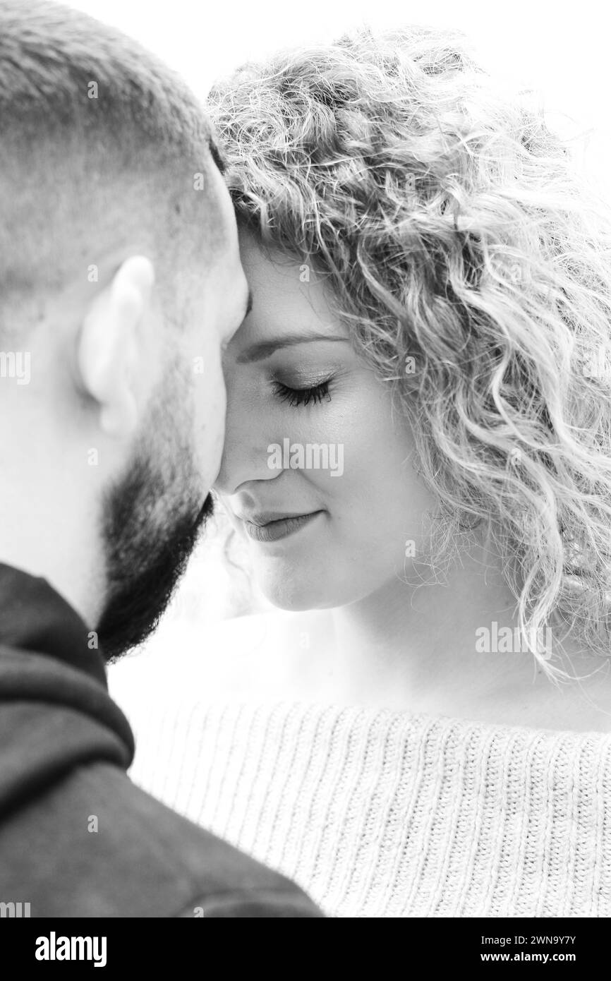 Couple forehead to forehead with closed eyes Stock Photo - Alamy