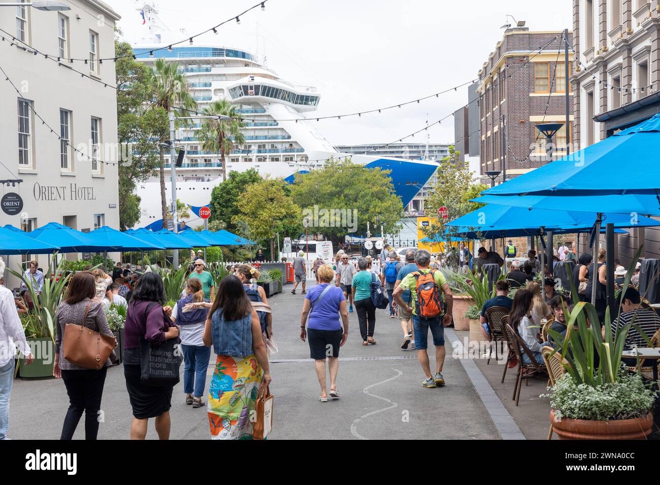 Sydney The rocks colonial area, tourists enjoy cafes and bars, cruise ...