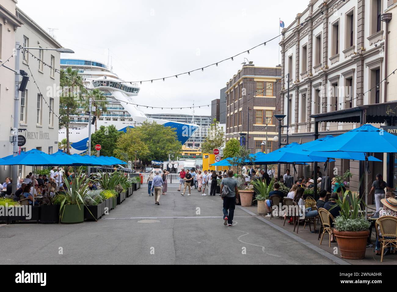 Sydney The rocks colonial area, tourists enjoy cafes and bars, cruise ...