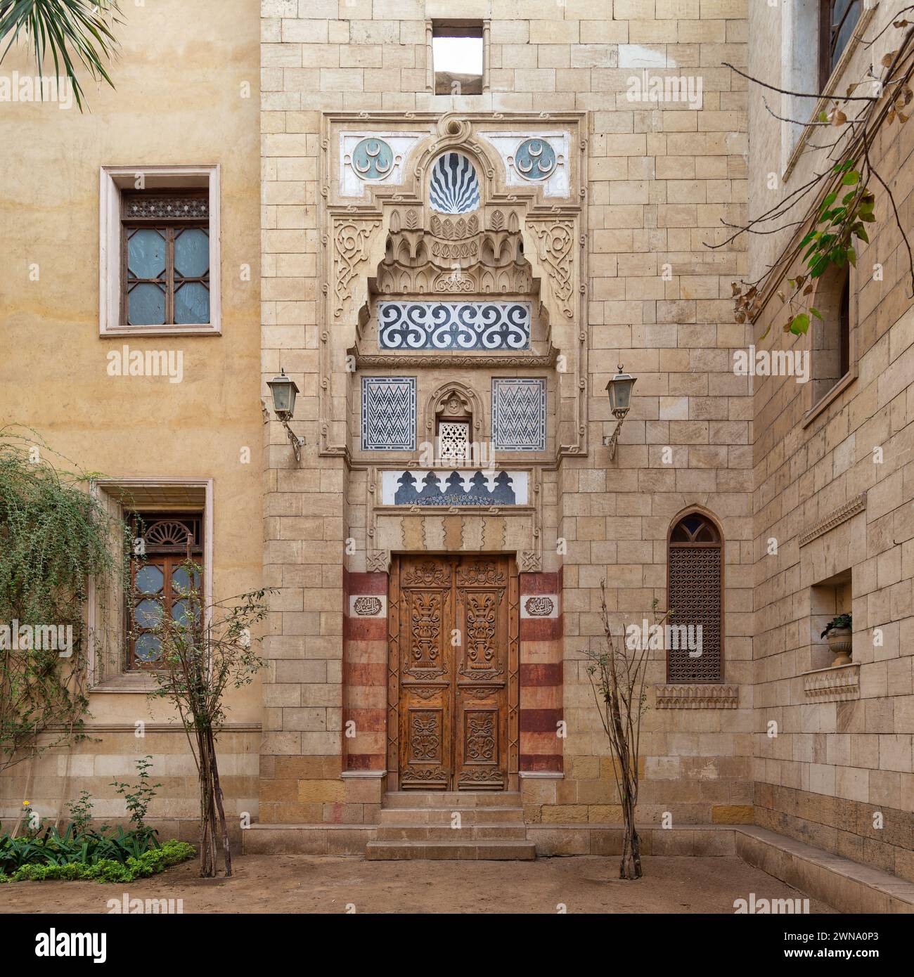 Ornately carved doorway and windows on Mamluk style facade at Prince ...