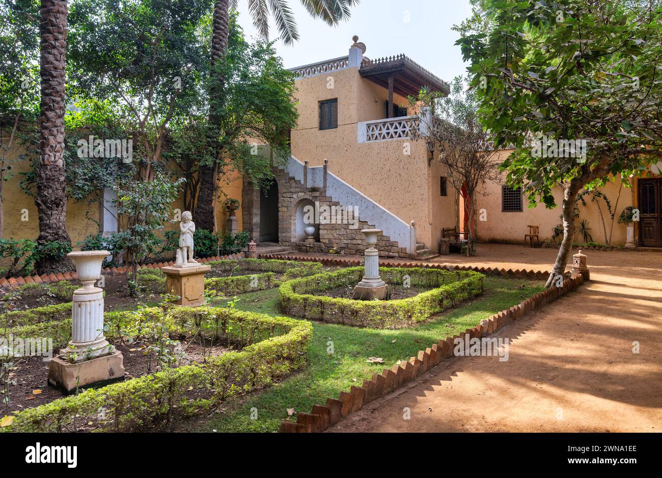 Lush greenery frames the tranquil garden of Prince Naguib Palace in ...