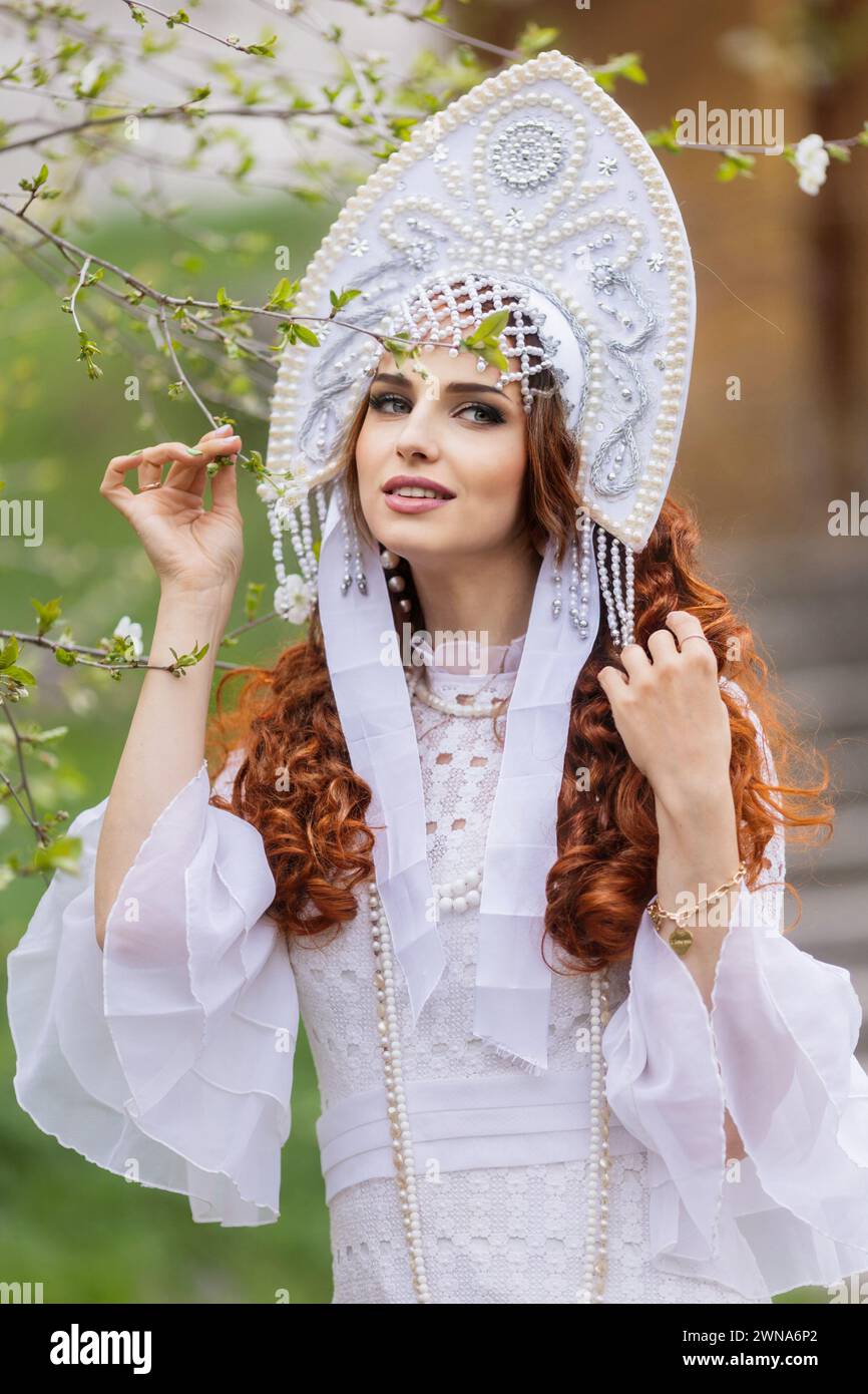 Stylish russian female in traditional national folk dress sundress and ...