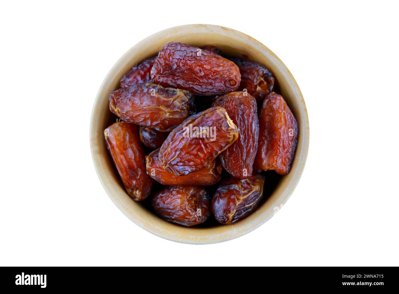 Dates fruit in a bowl isolated on a white background, Clipping path ...