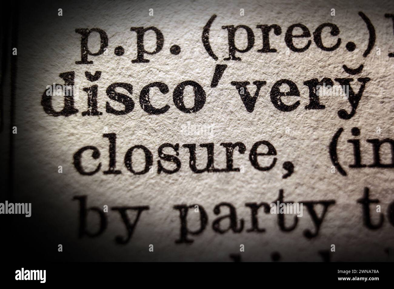 Word discovery on dictionary page, macro close-up Stock Photo - Alamy