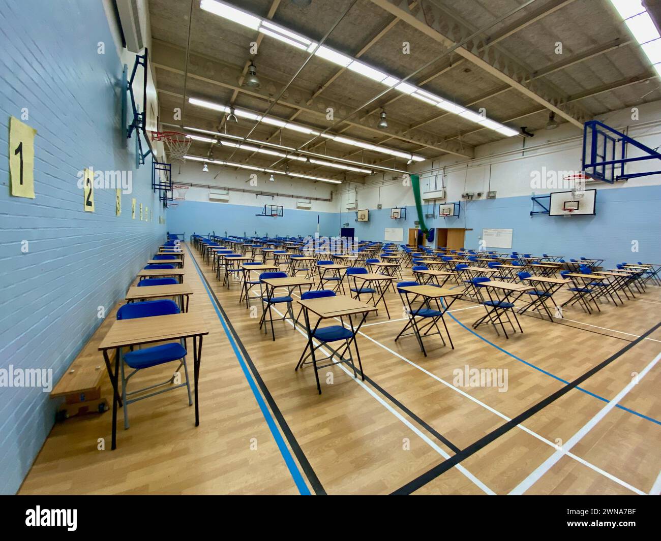 an english school sports hall set up and ready for public student ...