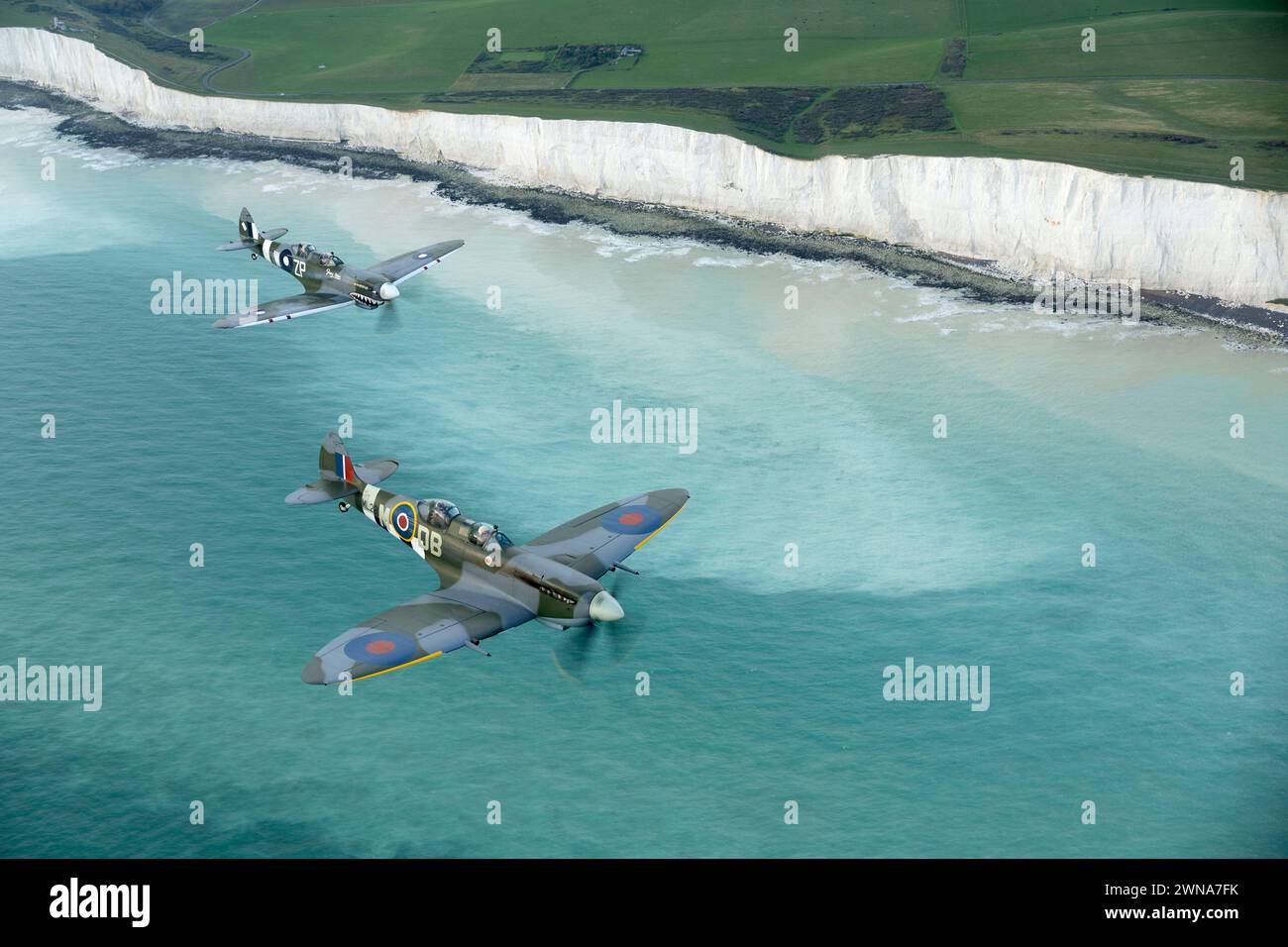 28/10/22 Spitfire ML295 (nearest) is escorted over Beachy Head by a ...