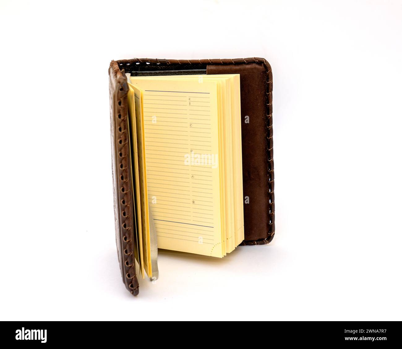 Open Notepad in dark brown genuine leather covers on a white background ...