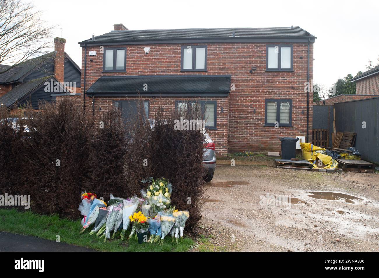 Beaconsfield, UK. 1st March, 2024. Floral tributes outside a house in ...