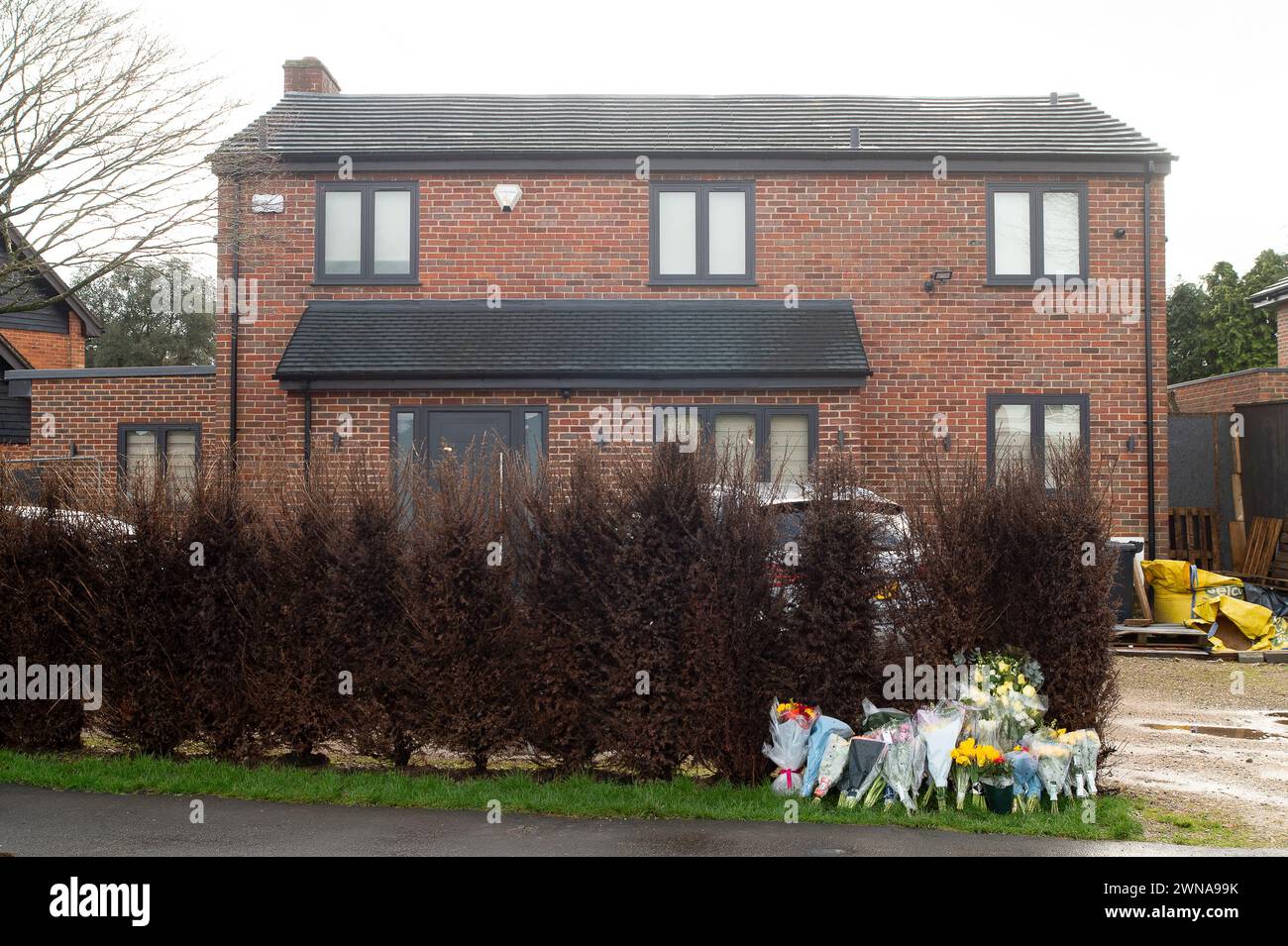 Beaconsfield, UK. 1st March, 2024. Floral tributes outside a house in ...