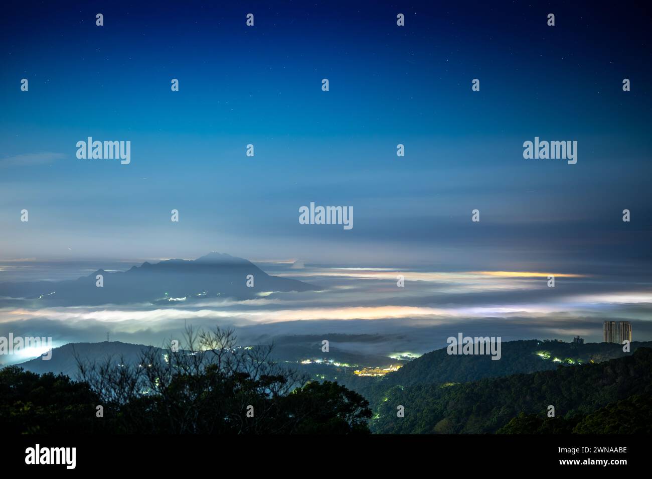 Clouds and mist drift over the city, and the colorful glaze light ...