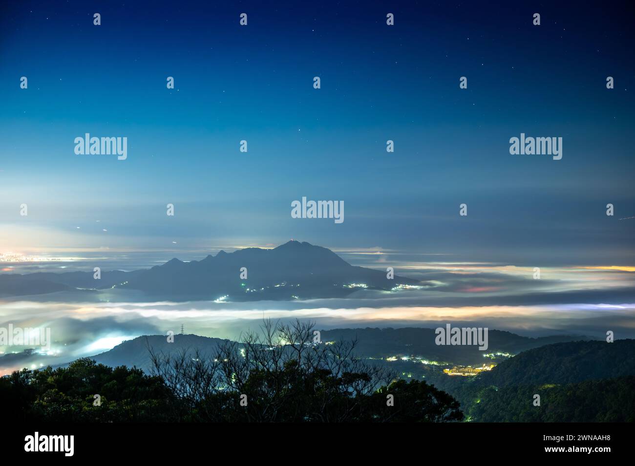 Clouds and mist drift over the city, and the colorful glaze light ...