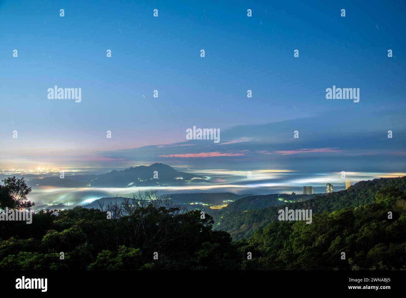 Clouds and mist drift over the city, and the colorful glaze light ...