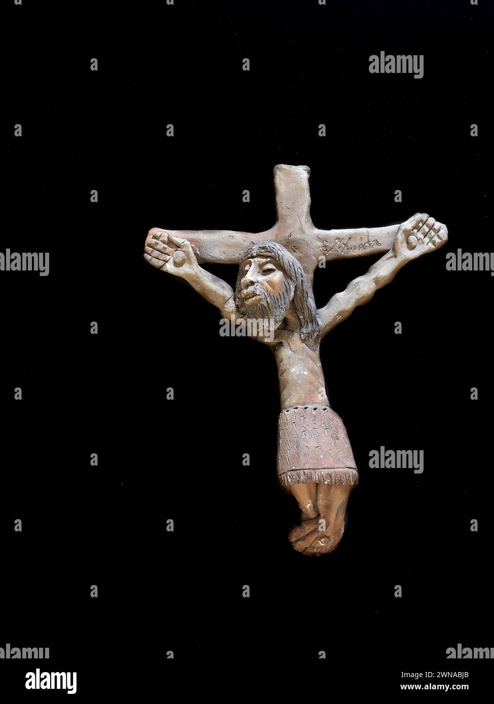 Clay figurine of the crucified Jesus Christ, inca style Stock Photo - Alamy