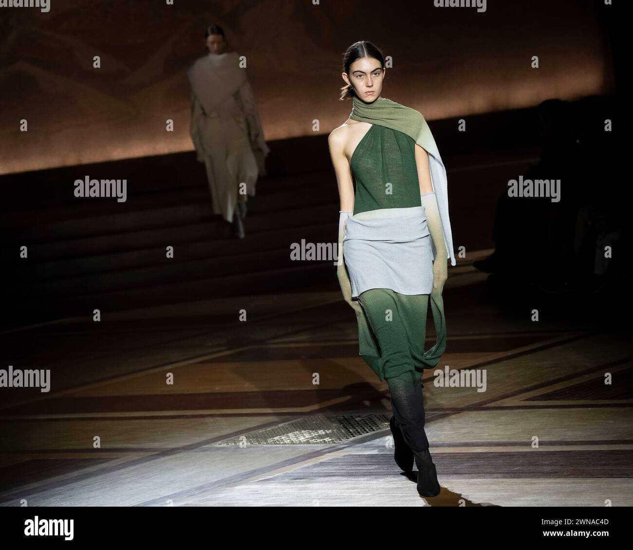 Models wear creations as part of the Issey Miyake Fall/Winter 2024-2025 ready-to-wear collection ...