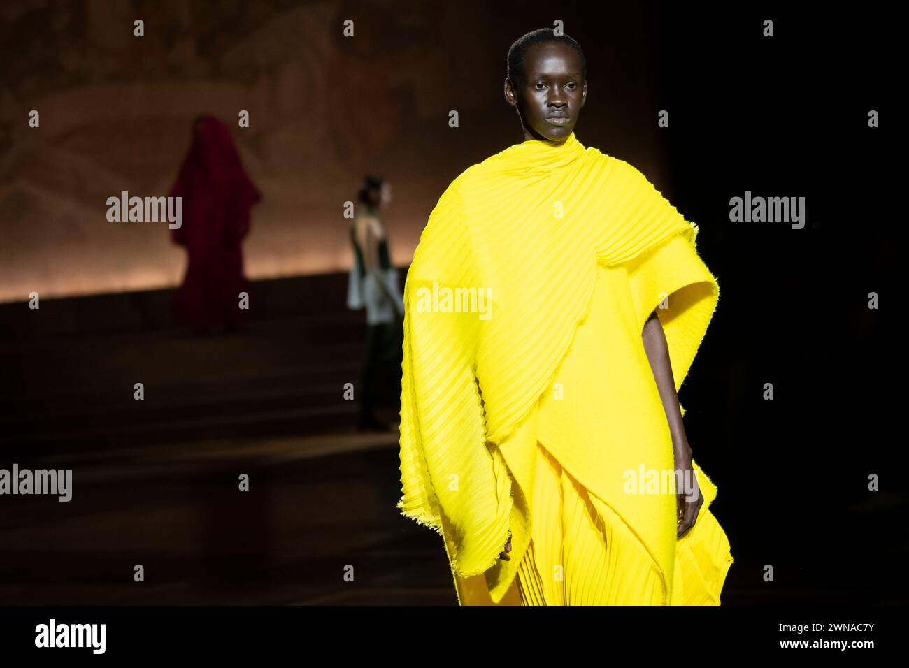 Models wear creations as part of the Issey Miyake Fall/Winter 2024-2025 ready-to-wear collection ...