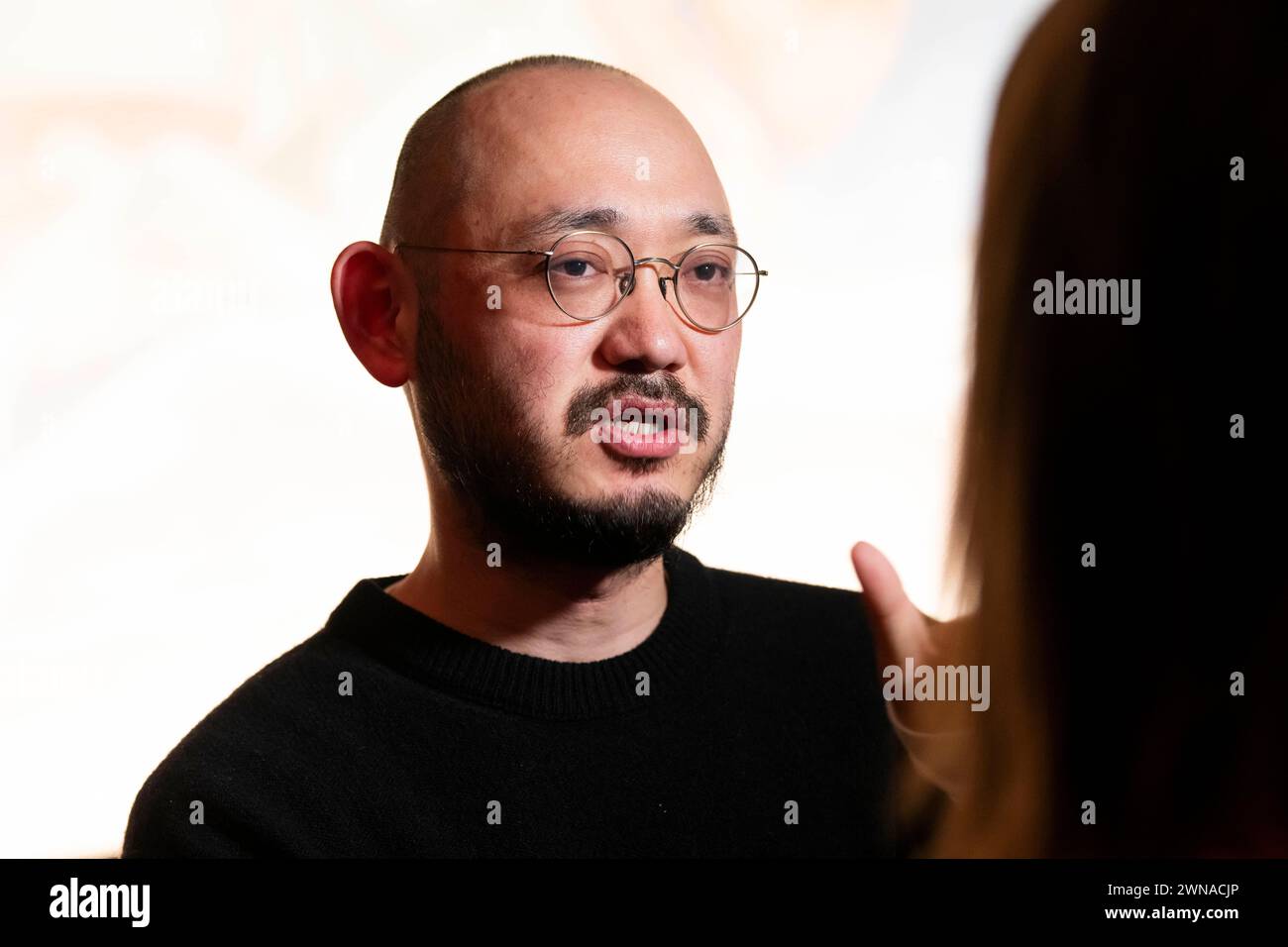 Designer Satoshi Kondo is interviewed after the Issey Miyake Fall ...