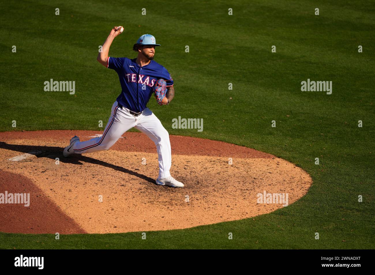 Texas Rangers relief pitcher Yerry Rodriguez throws during a spring ...
