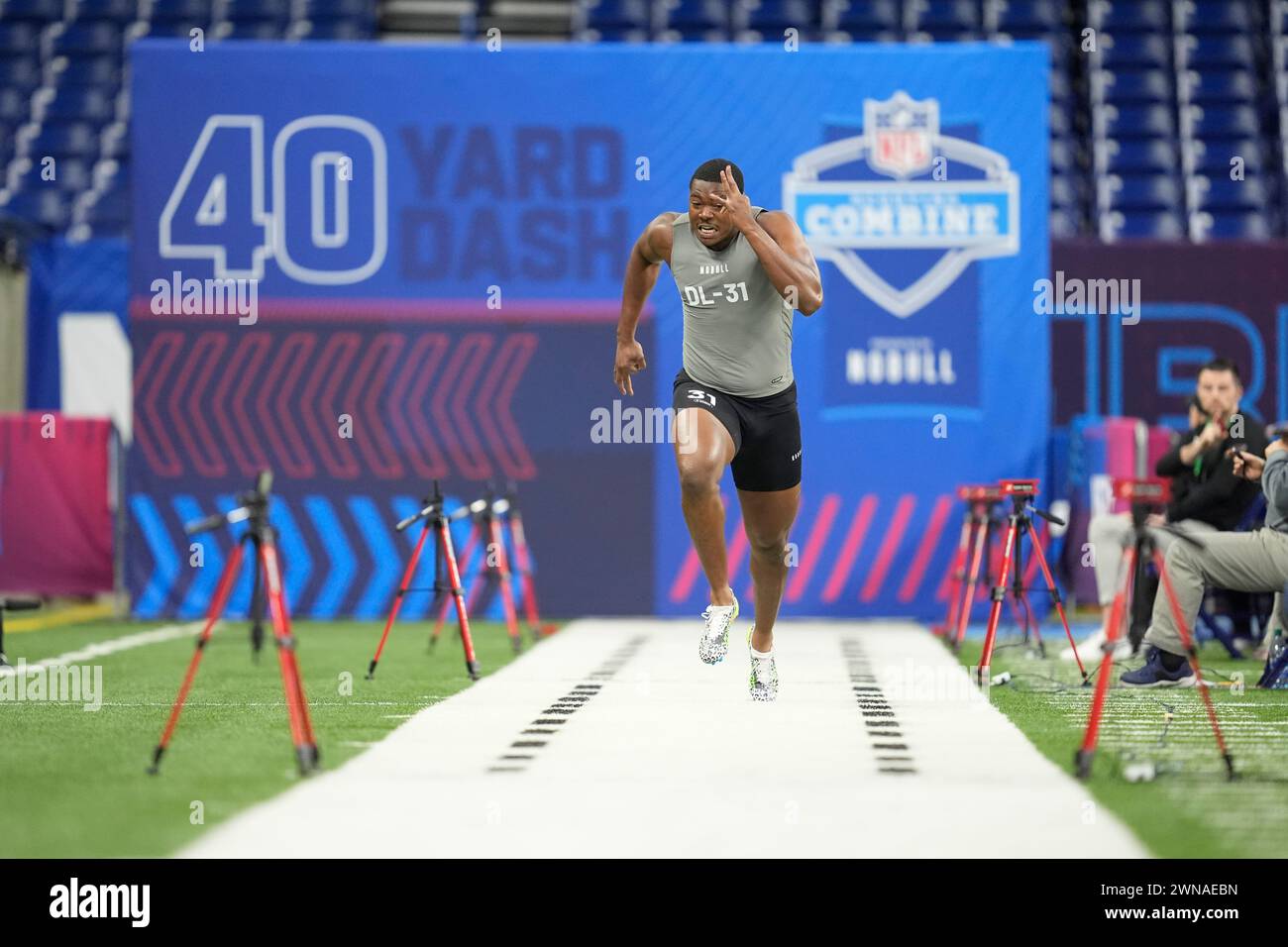 Texas Tech defensive lineman Myles Cole runs the 40-yard dash at the NFL football scouting ...