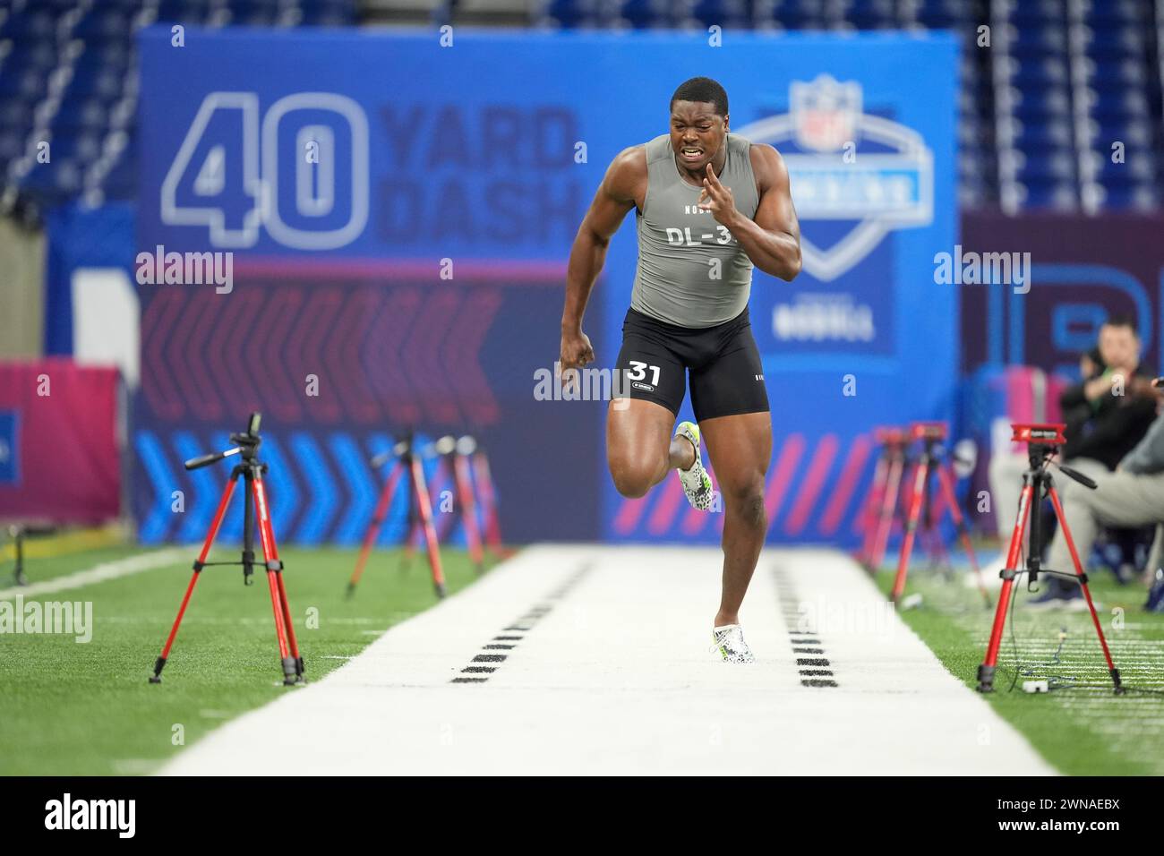 Texas Tech defensive lineman Myles Cole runs the 40-yard dash at the NFL football scouting ...