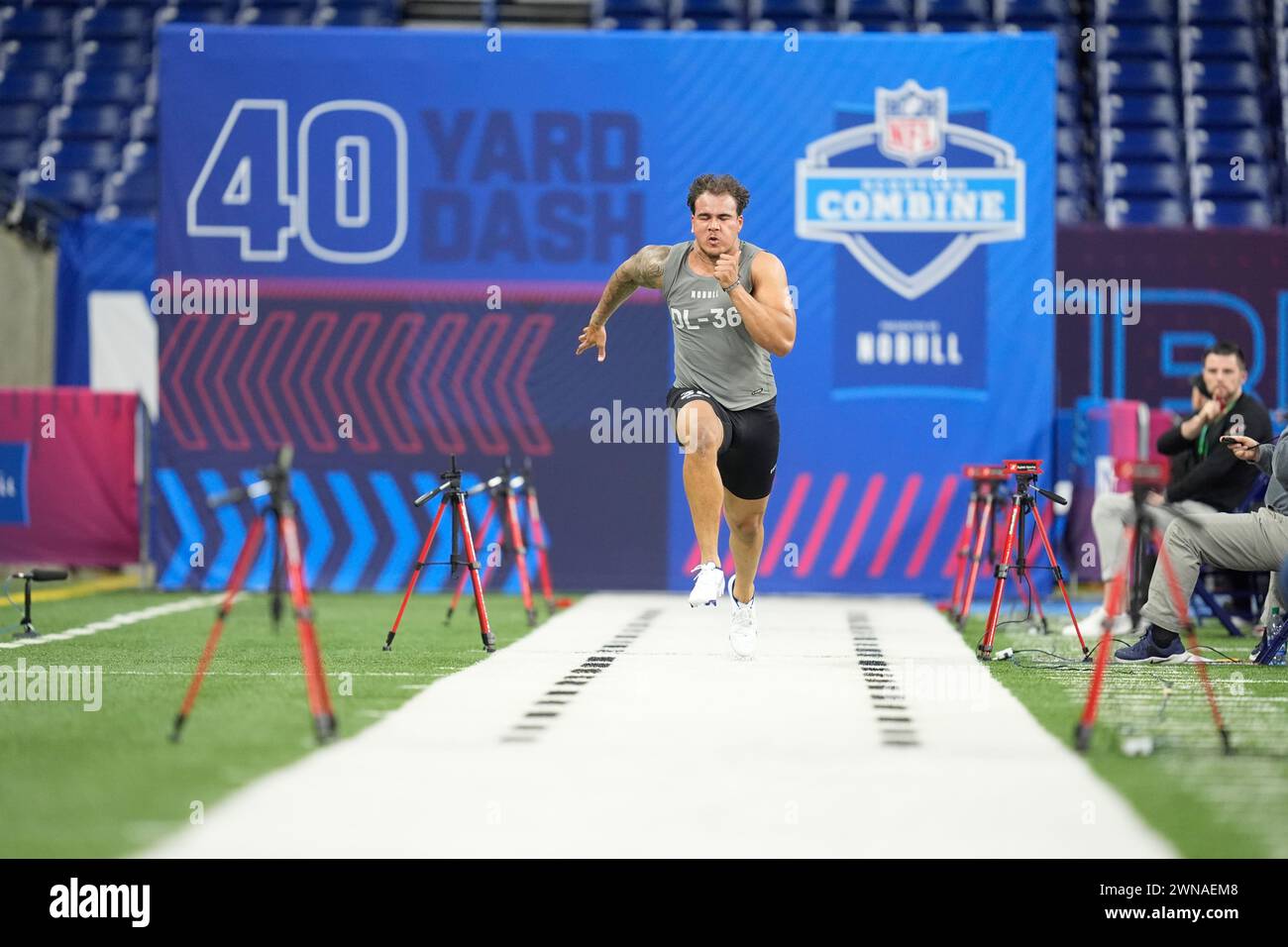 Washington State defensive lineman Brennan Jackson runs the 40-yard dash at the NFL football ...