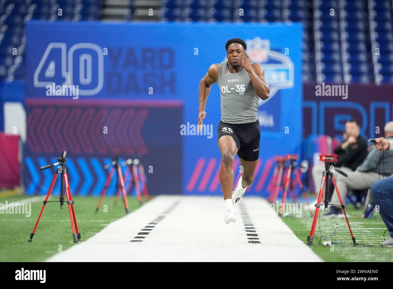 Penn State defensive lineman Adisa Isaac runs the 40-yard dash at the ...
